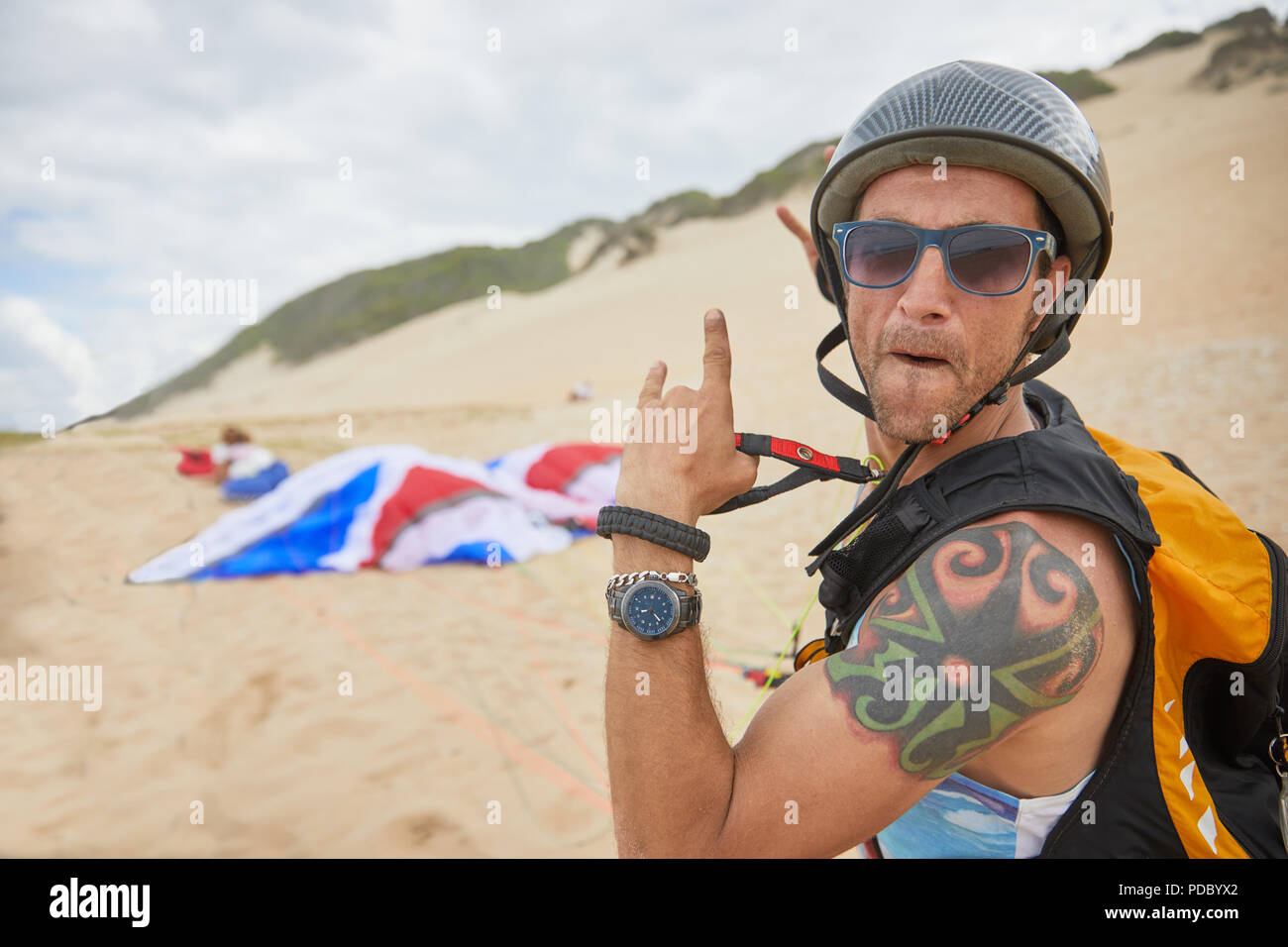 Portrait confident, carefree male paraglider on beach Stock Photo - Alamy Portrait confident, carefree male paraglider on beach Stock Photo - Alamy