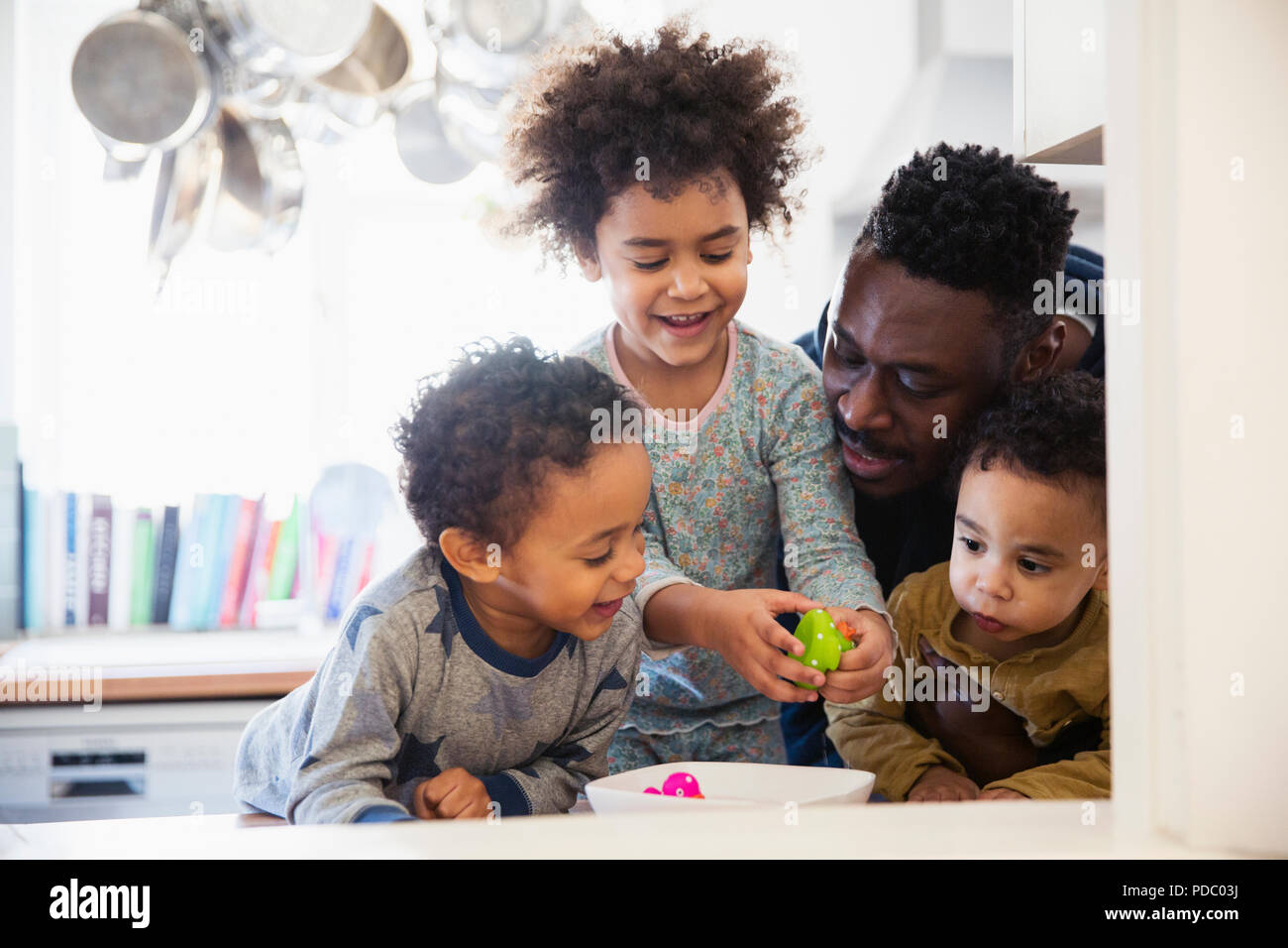 Children playing together ethnic hi-res stock photography and images ...