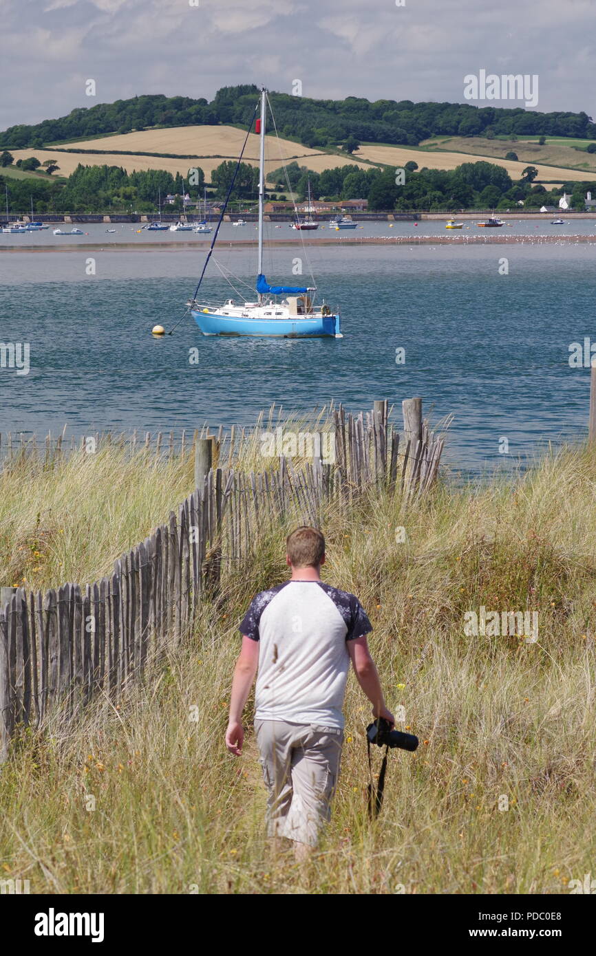 Nature Photographer Strolling over Dawlish Warren Nature Reserve ...