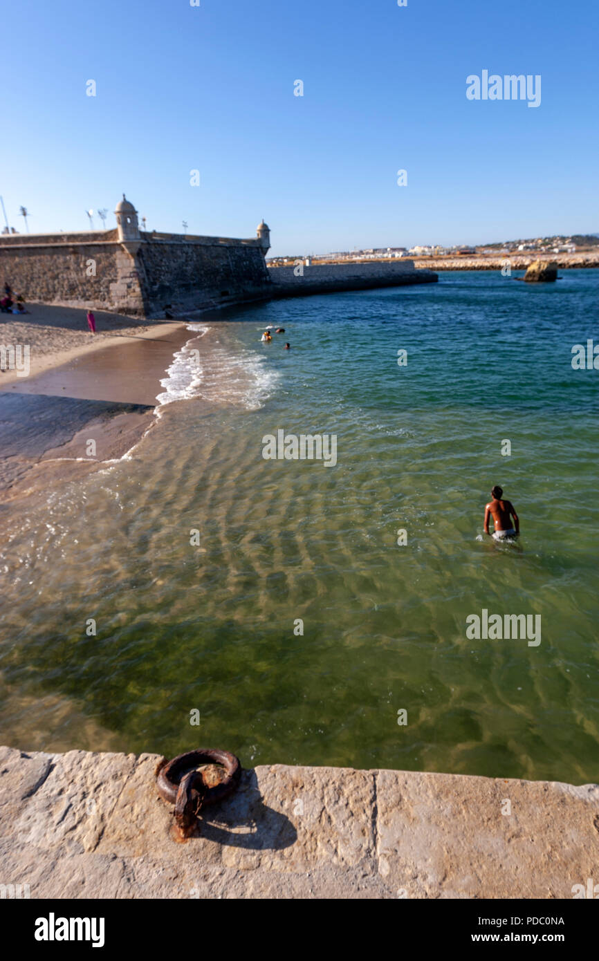 Praia do Cais da Solária and Forte da Ponta da Bandeira, Lagos, Algarve ...