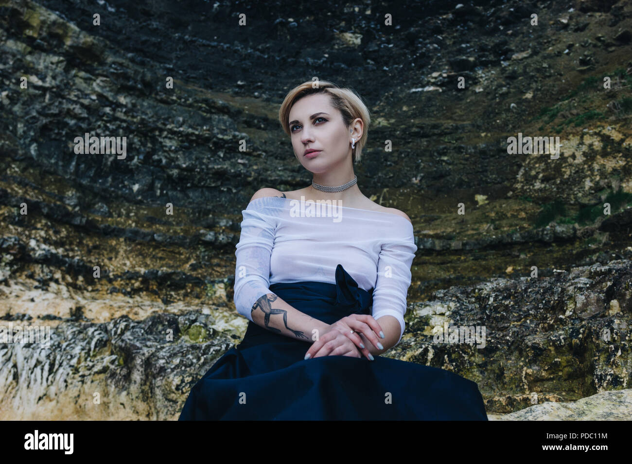 beautiful young woman posing near cliff, Etretat, Normandy, France ...
