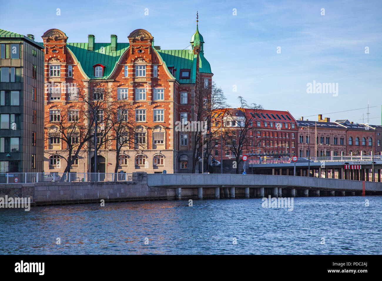 front view of cityscape with buildings and river in Copenhagen, Denmark ...