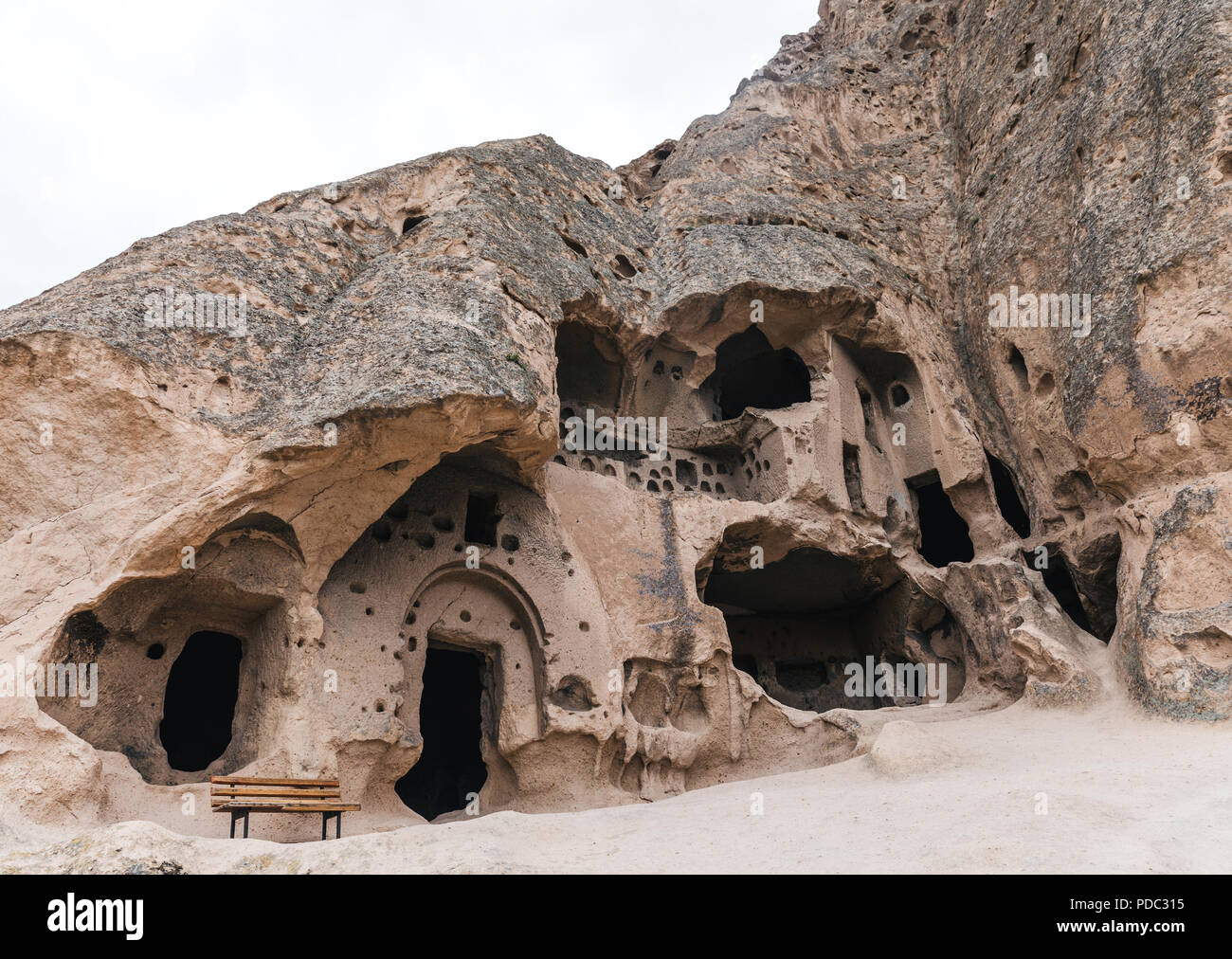 low angle view of majestic caves in limestone at famous cappadocia ...