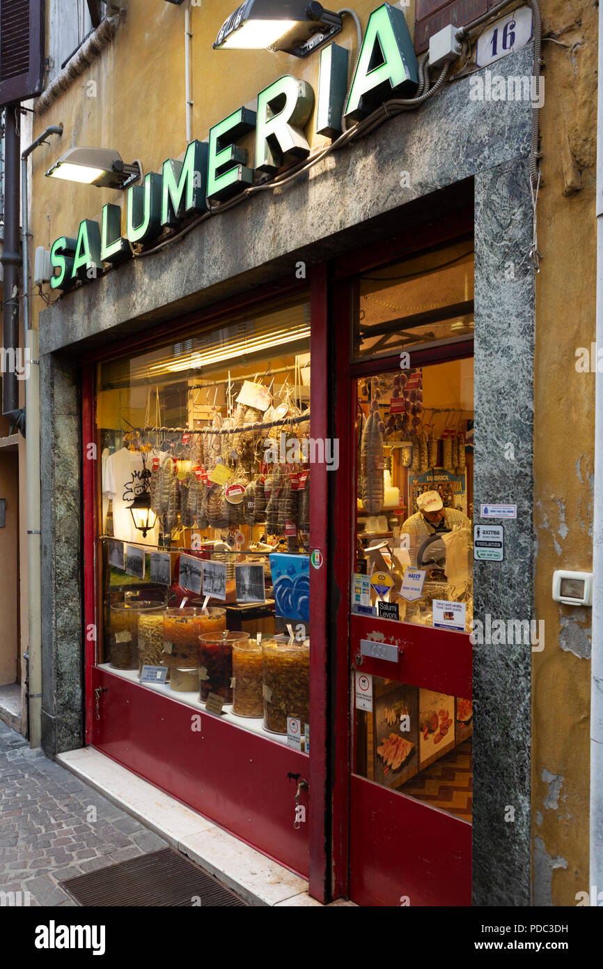 A salumeria in Mantua, Italy. The store sells traditional salumi, meat ...