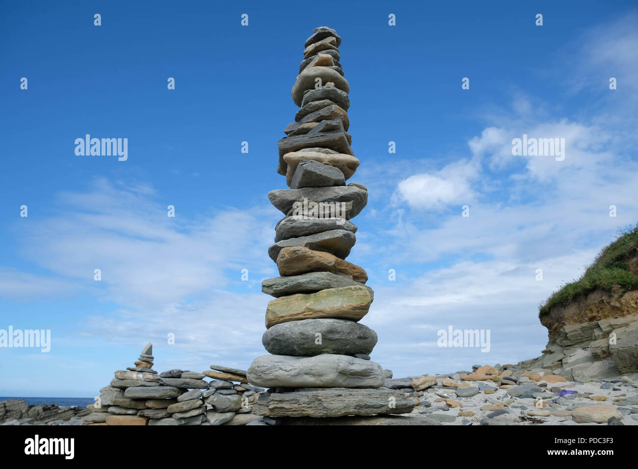 Stones stacked on beach hi-res stock photography and images - Alamy
