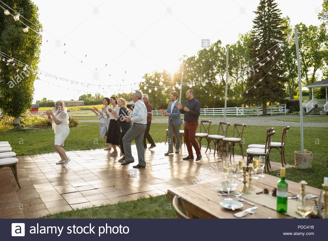 Family celebrating wedding reception hi-res stock photography and ...