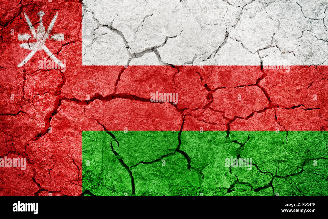 Sultanate of Oman flag on dry earth ground texture background Stock ...