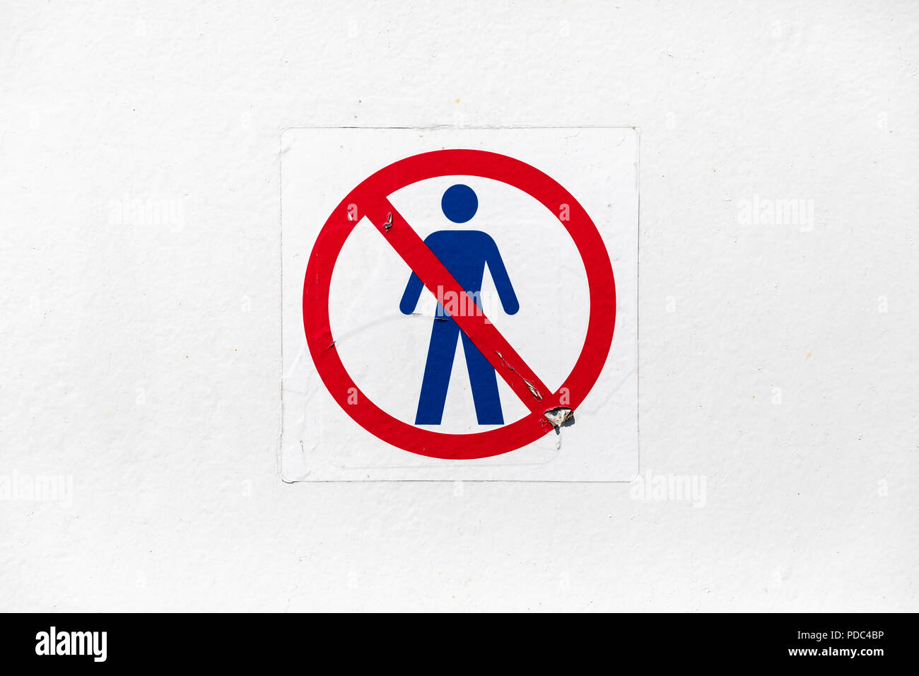 No entry pictogram, partly torn, on white background Stock Photo - Alamy