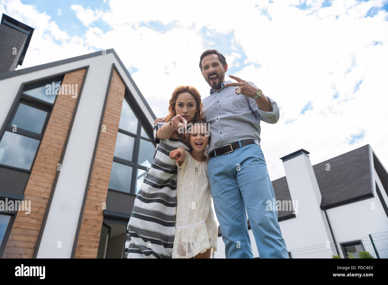 Pleasant cute girl pointing at you Stock Photo - Alamy