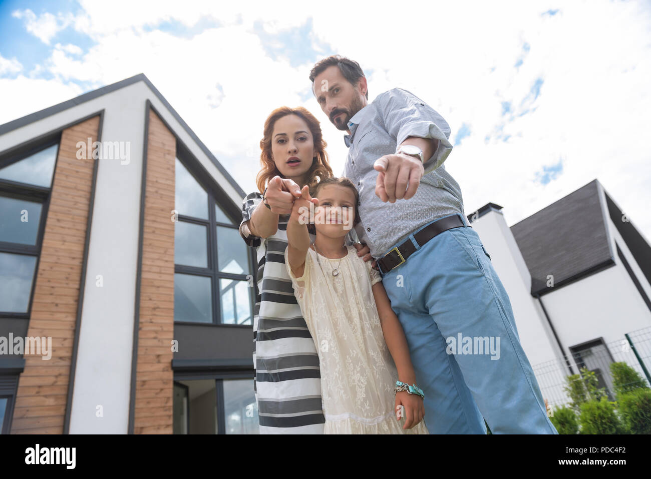 Nice pleasant people pointing at you Stock Photo - Alamy