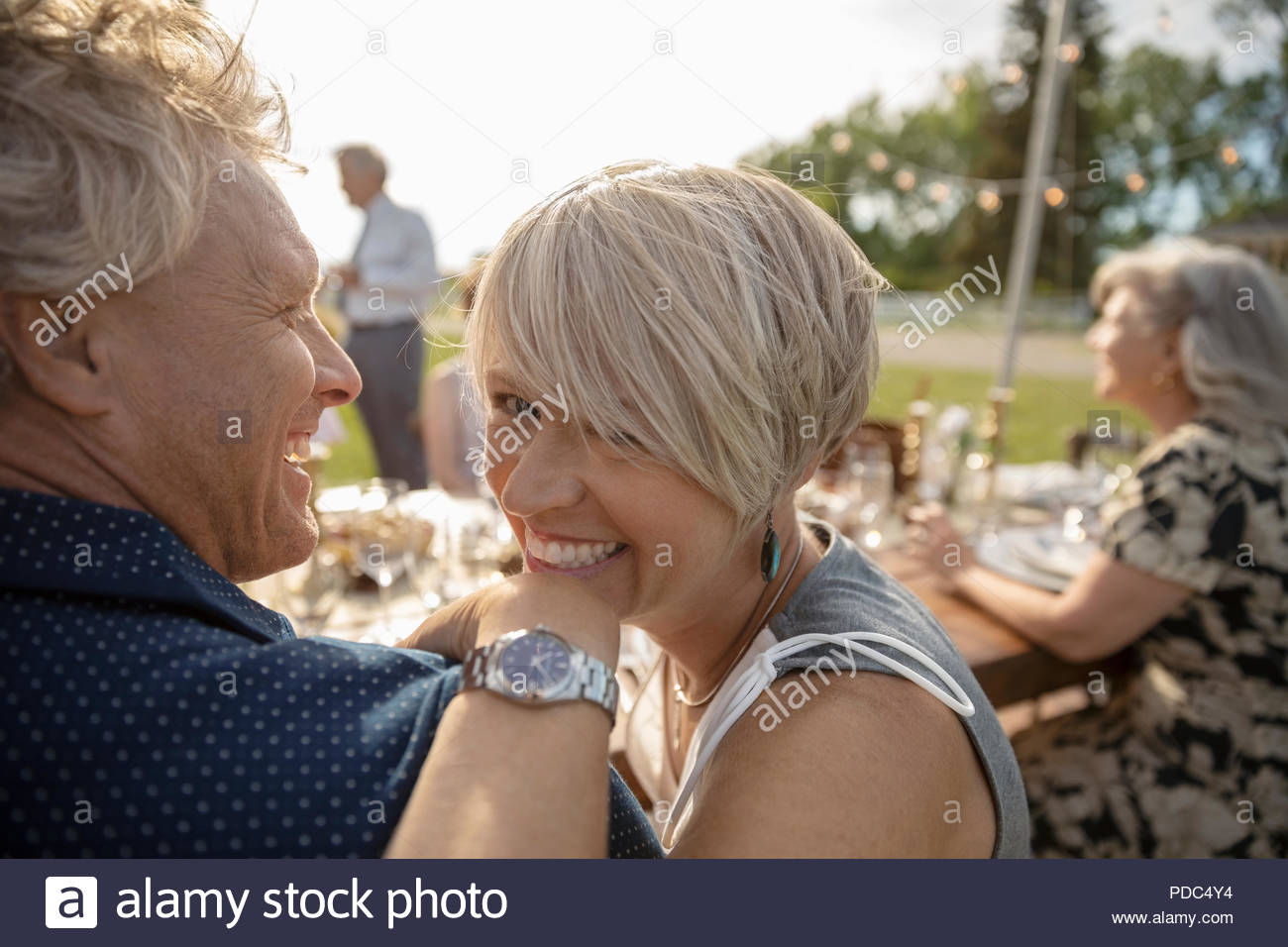 Happy wedding couple smiling together hi-res stock photography and ...