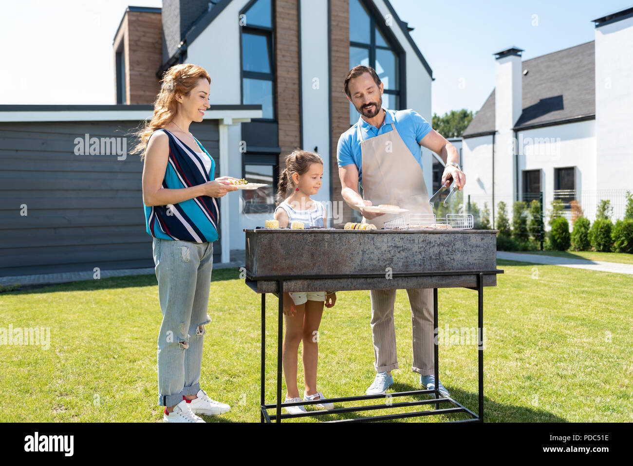 Joyful hungry woman waiting for food Stock Photo - Alamy