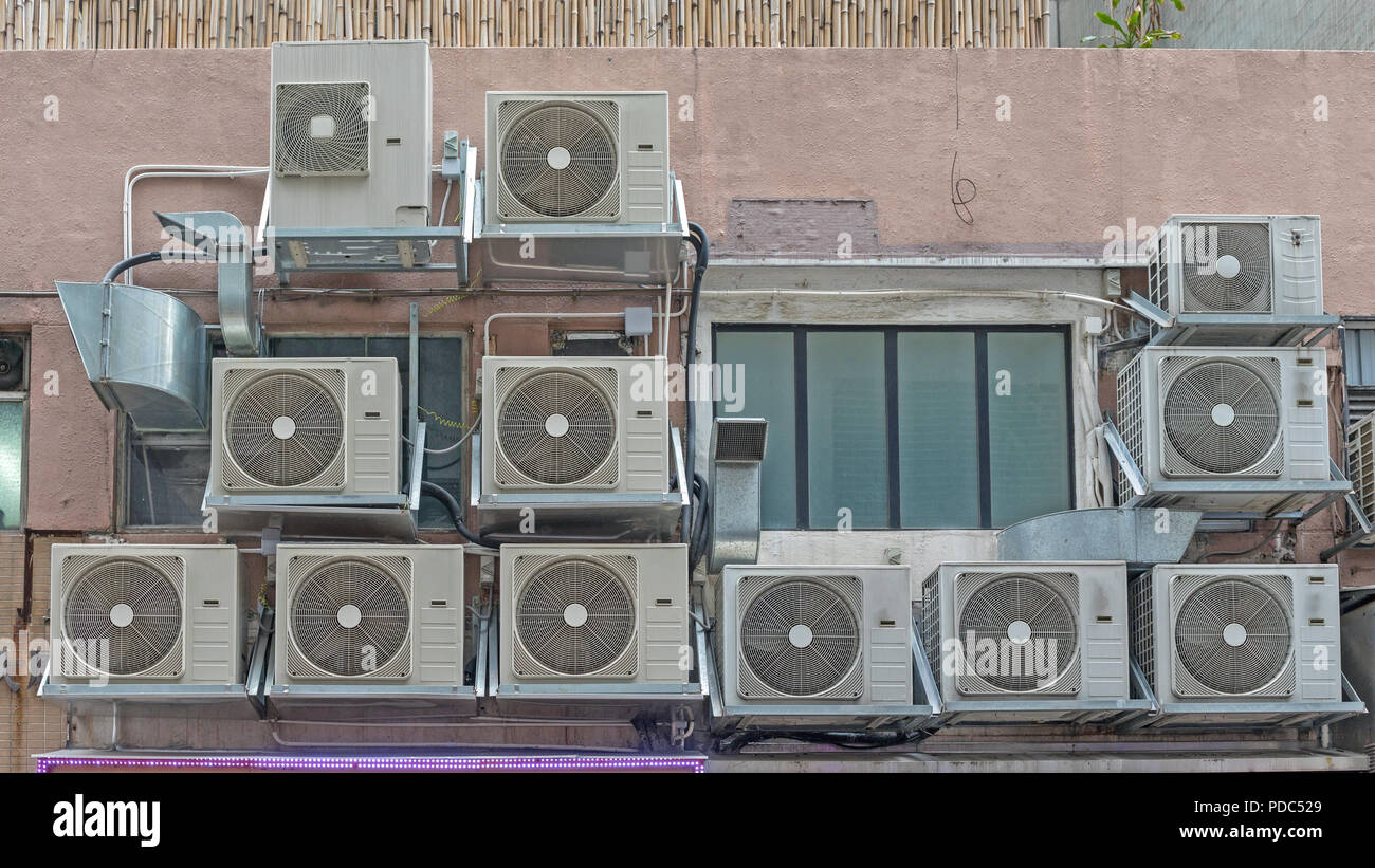 Many Air Conditioner Units at Building Exterior Stock Photo - Alamy