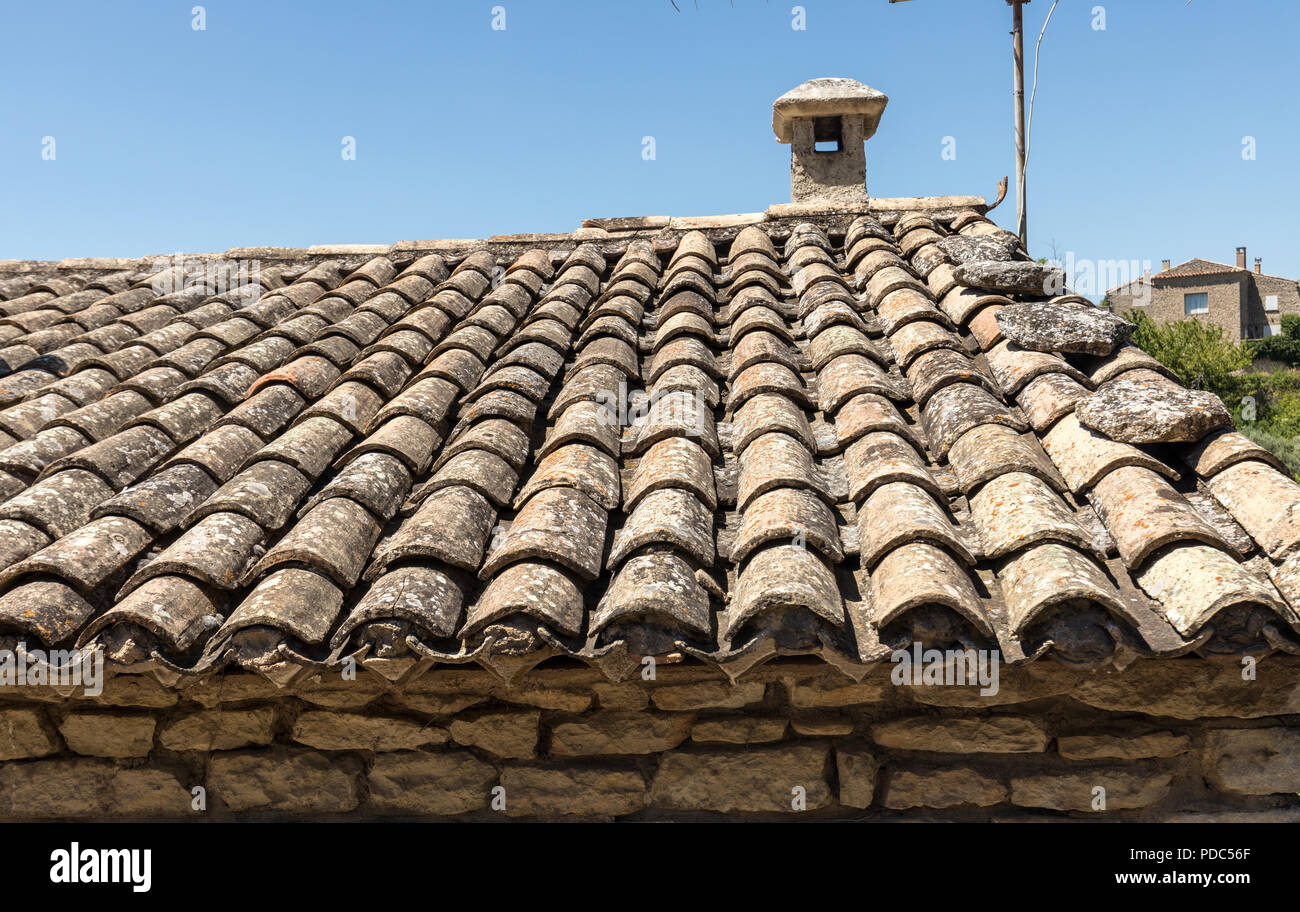 Old fashioned style roof tiles on rural building in Provence France ...