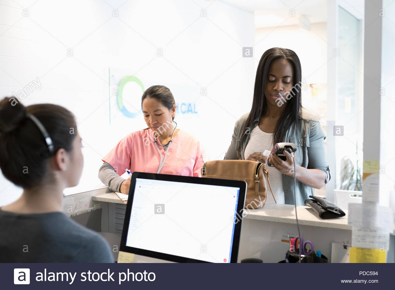Doctors receptionist hi-res stock photography and images - Alamy