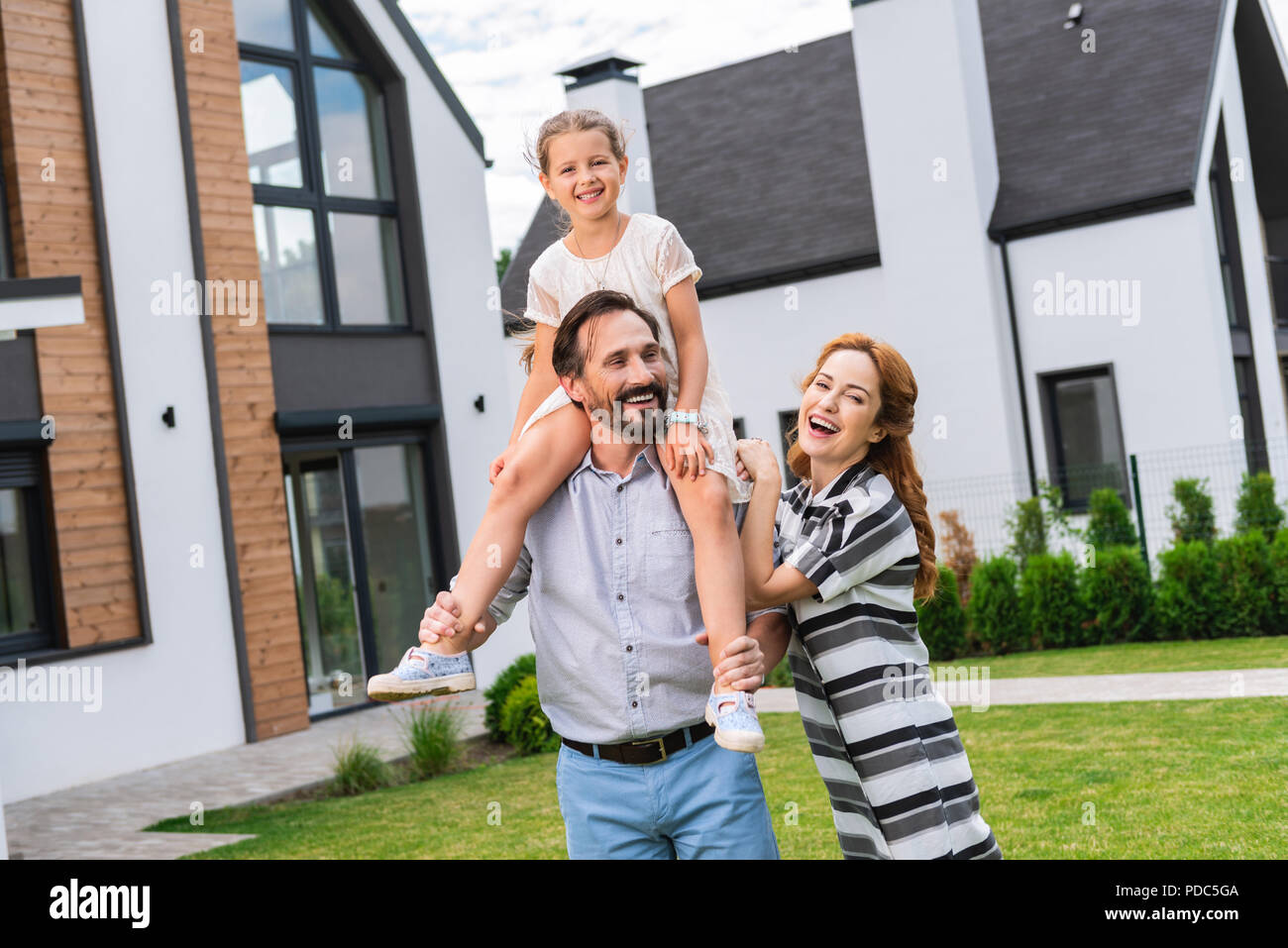 Happy family enjoying rest hi-res stock photography and images - Alamy