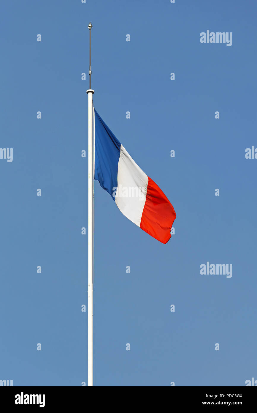 French flag tricolor flying at blue sky Stock Photo - Alamy