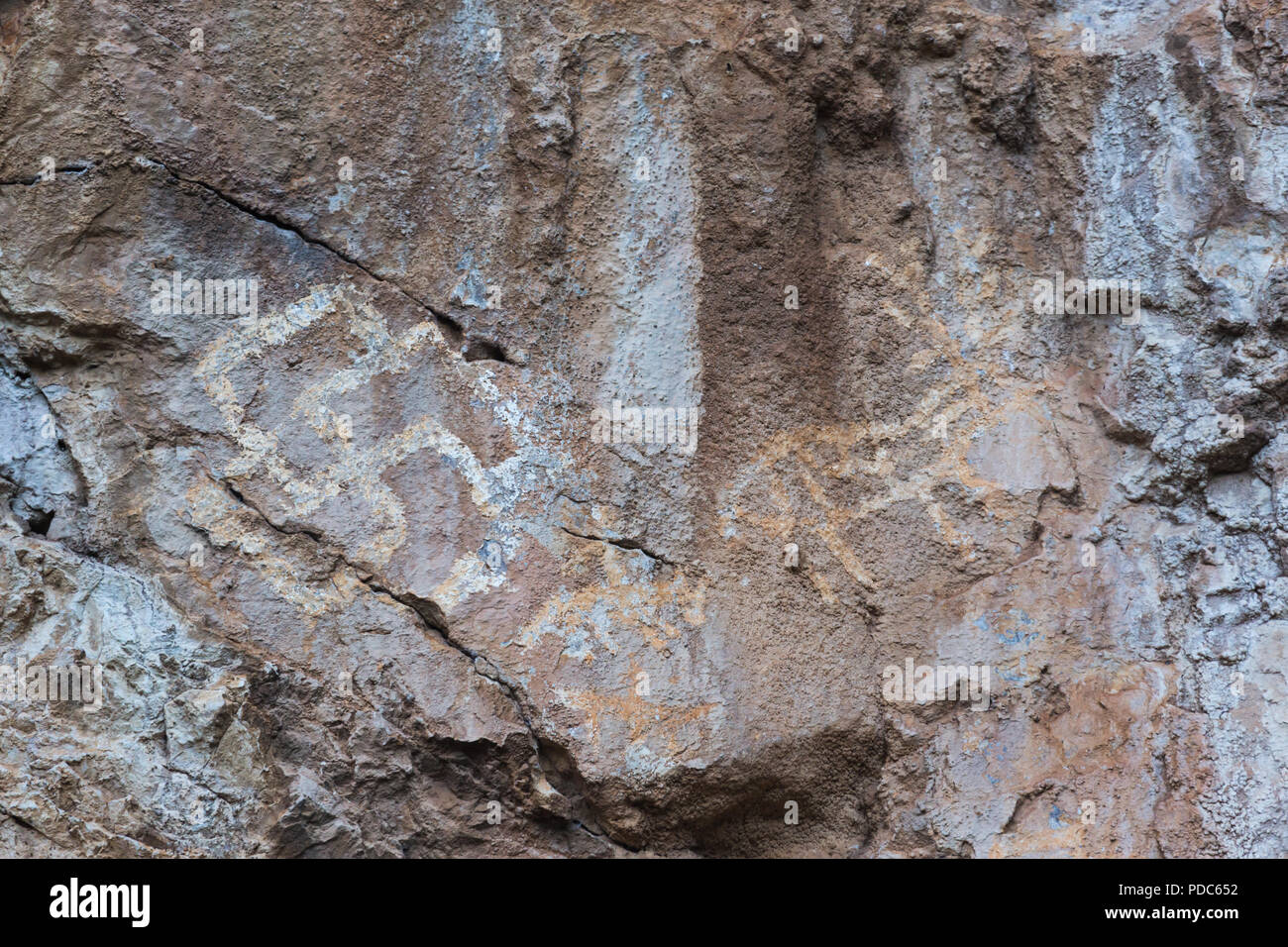 Ancient prehistoric archaeological rock drawings of hunting scenes ...