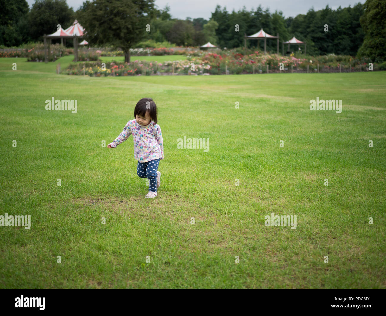Little chinese girl running hi-res stock photography and images - Alamy