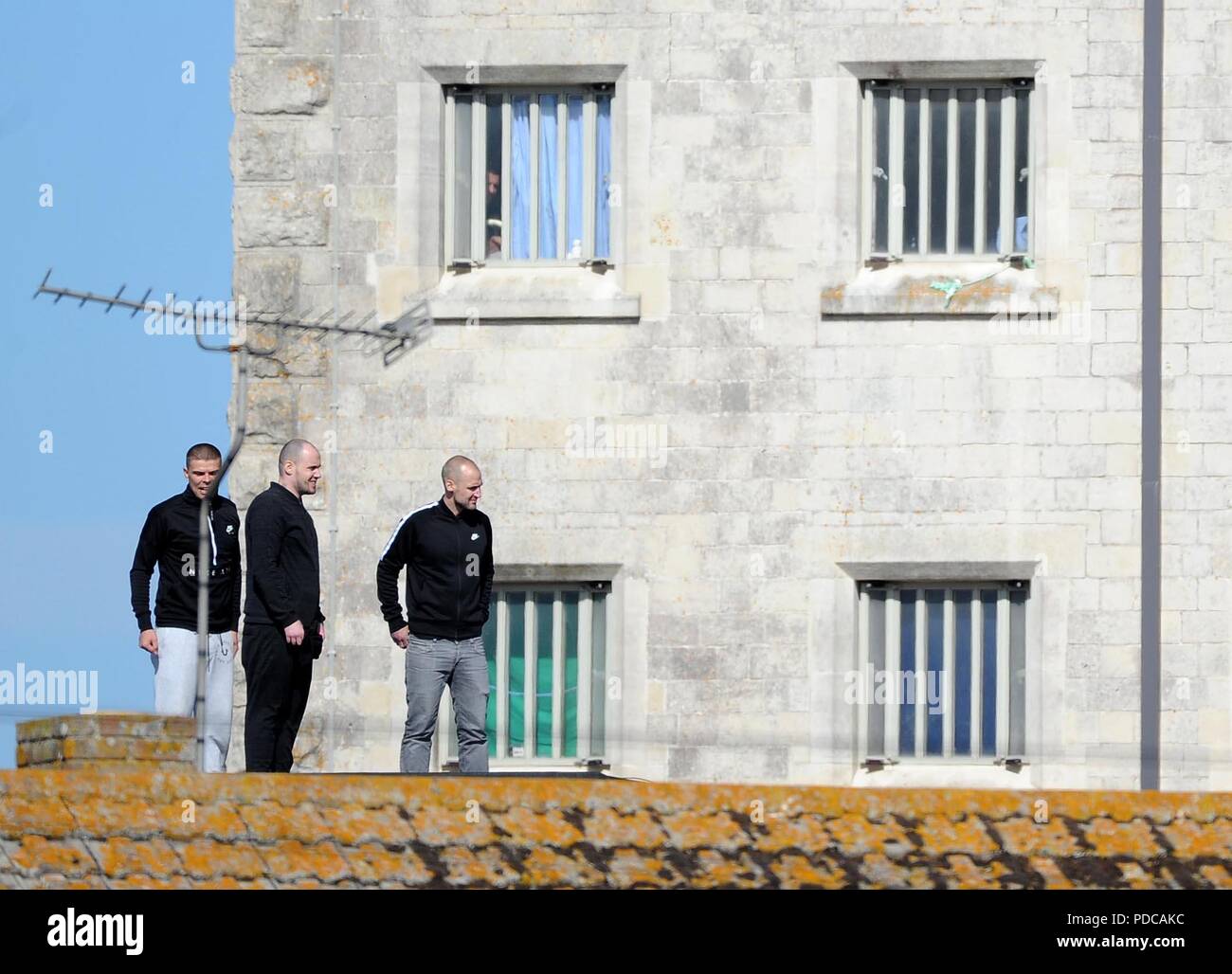 Prison protest, Three prisoners protest on the rooftop of HM Prison ...