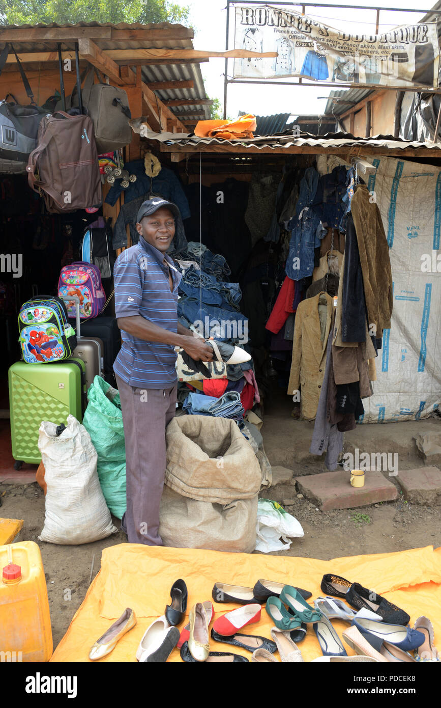 Nairobi, Kenya. 08th Aug, 2018. The second-hand clothes dealer Simon ...