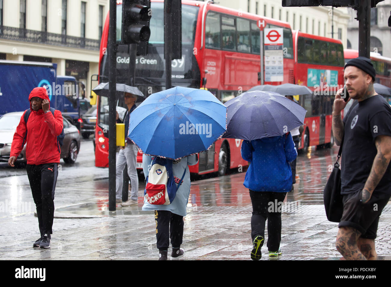 London,UK,9th August 2018,Typical British wet weather resumes in London ...