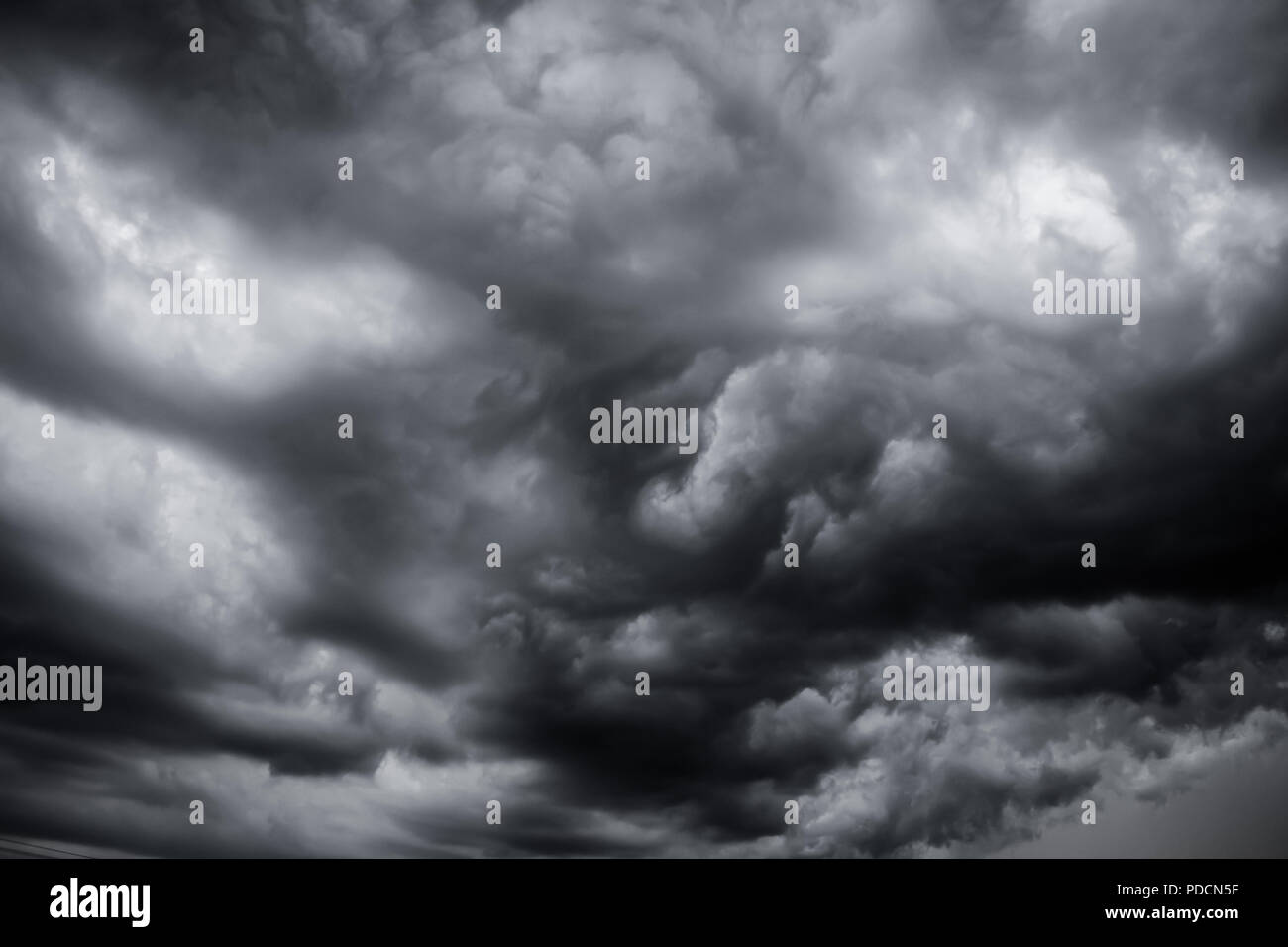 Cloudy stormy black and white dramatic sky background Stock Photo - Alamy