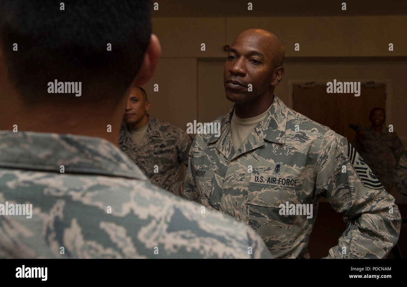 Chief Master Sgt. of the Air Force, Kaleth O. Wright, speaks with Airmen from the 501st Combat ...