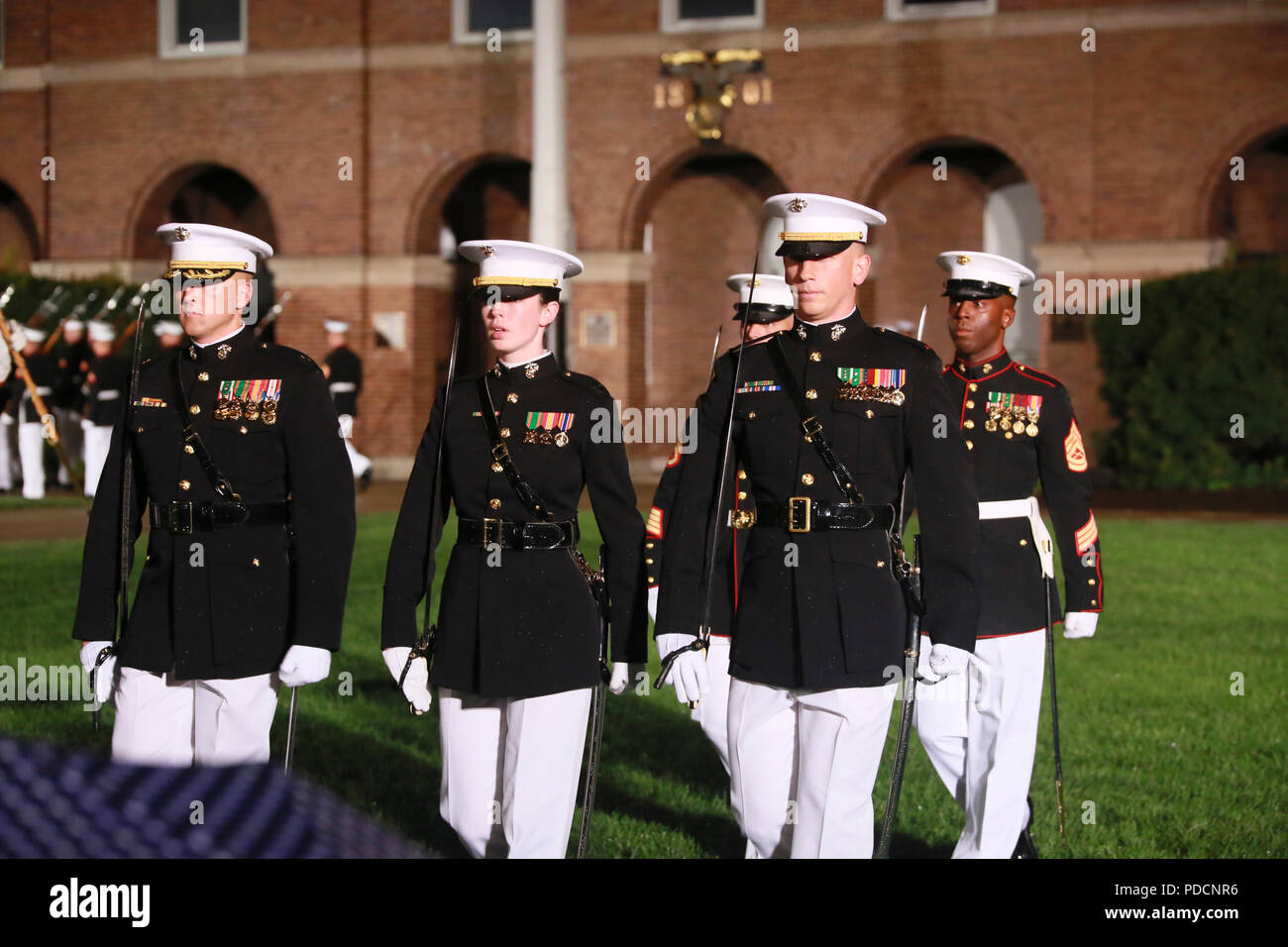 Marines with the Marine Barracks Washington D.C. parade marching staff ...
