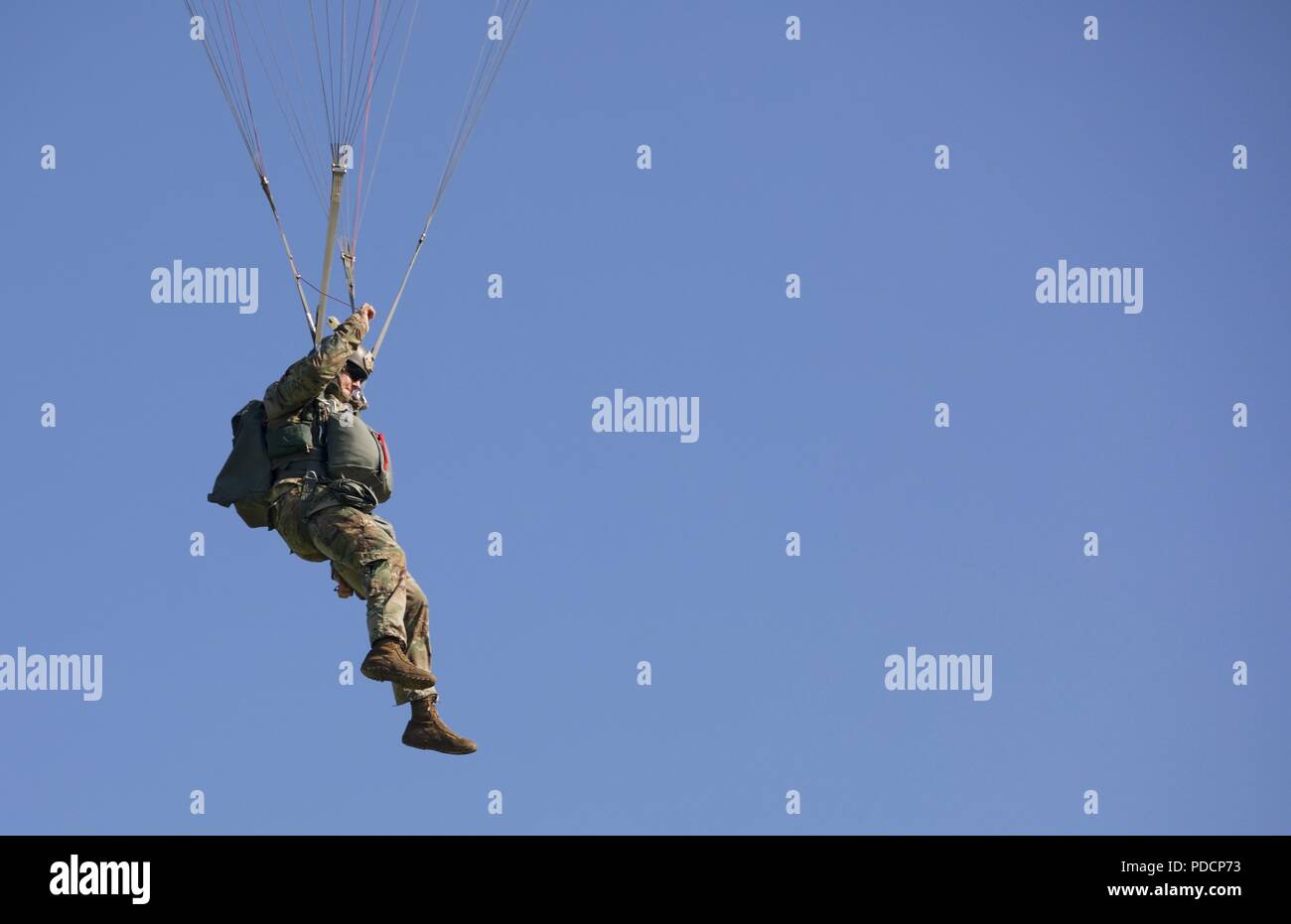 A U.S. Army Paratrooper descends using his MC-6 parachute onto Castle ...