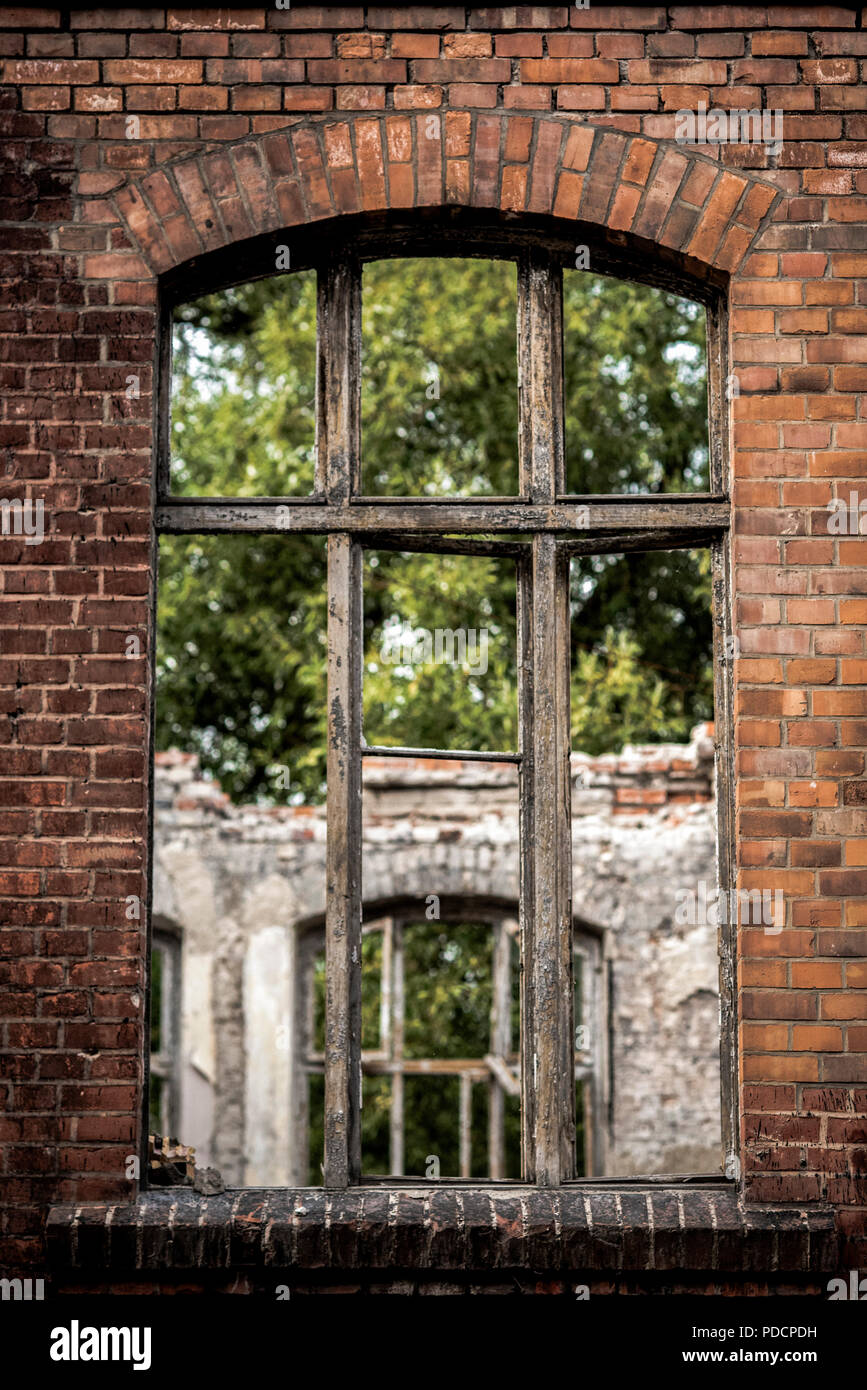 Old destroyed window with broken windows in a brick wall Stock Photo ...