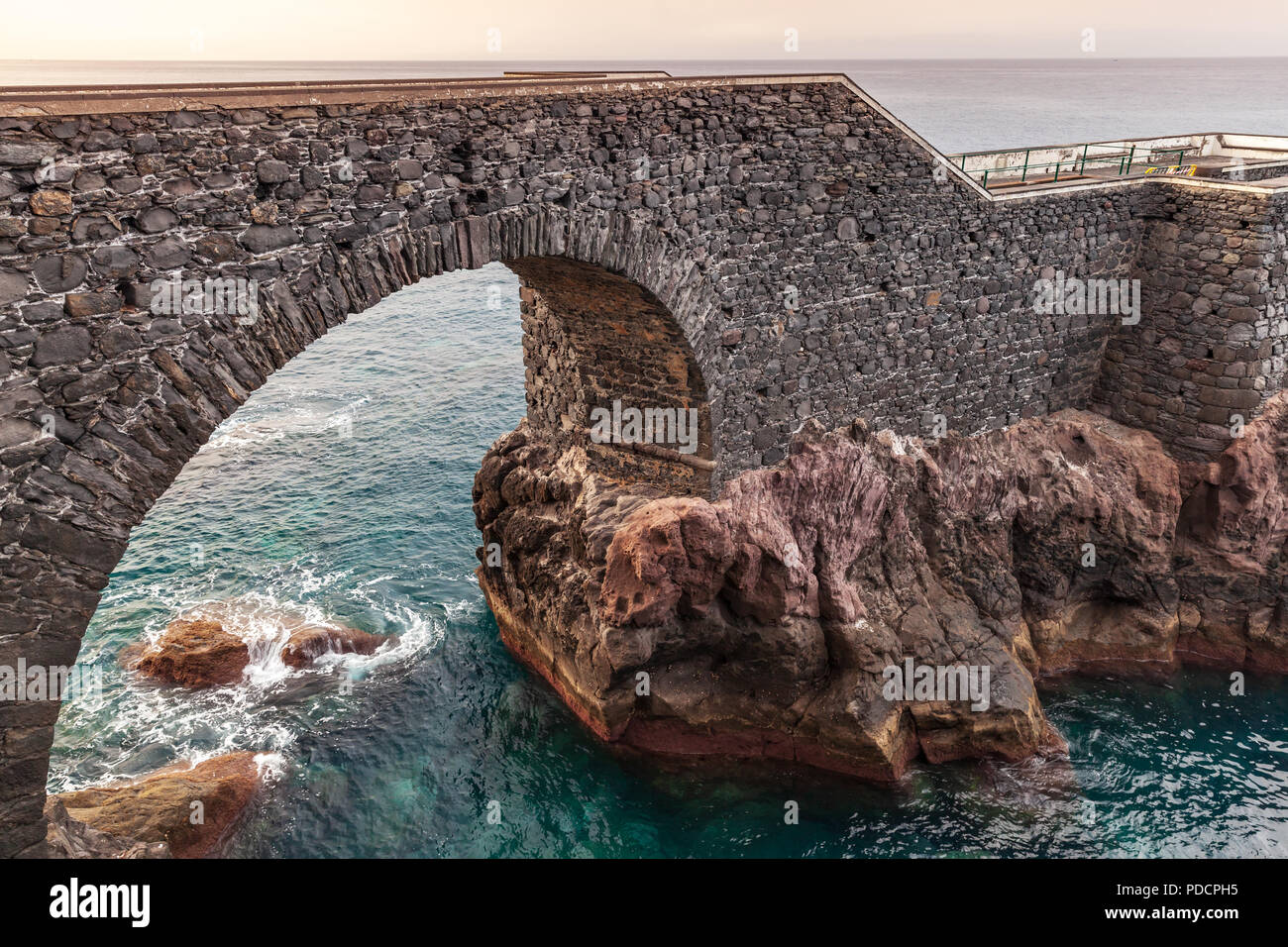 Old arch bridge in Ponta do Sol, Madeira island, Portugal Stock Photo ...