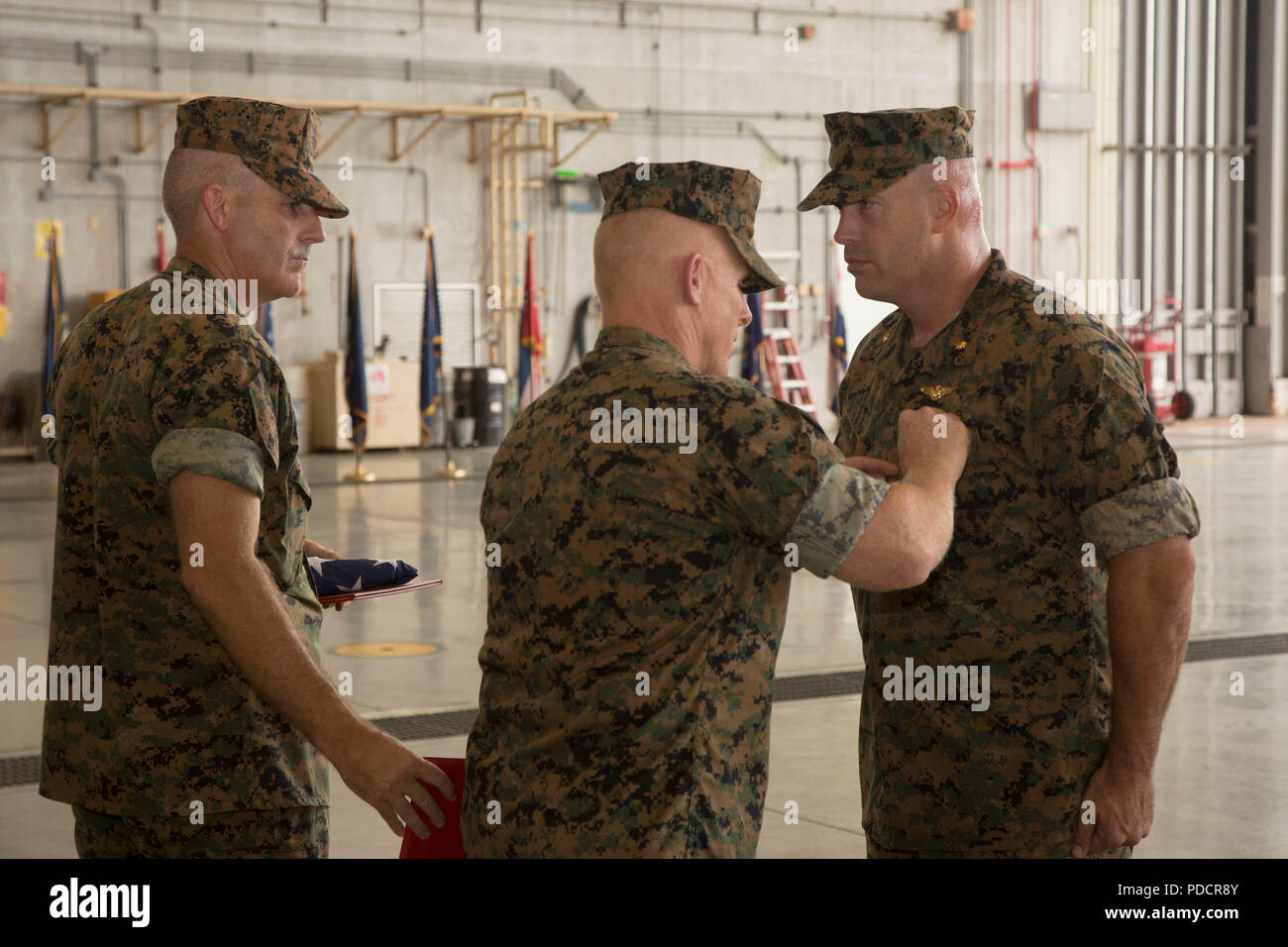 Maj. Daniel Groeling, receives the meritorious service medal Aug 3. The ...