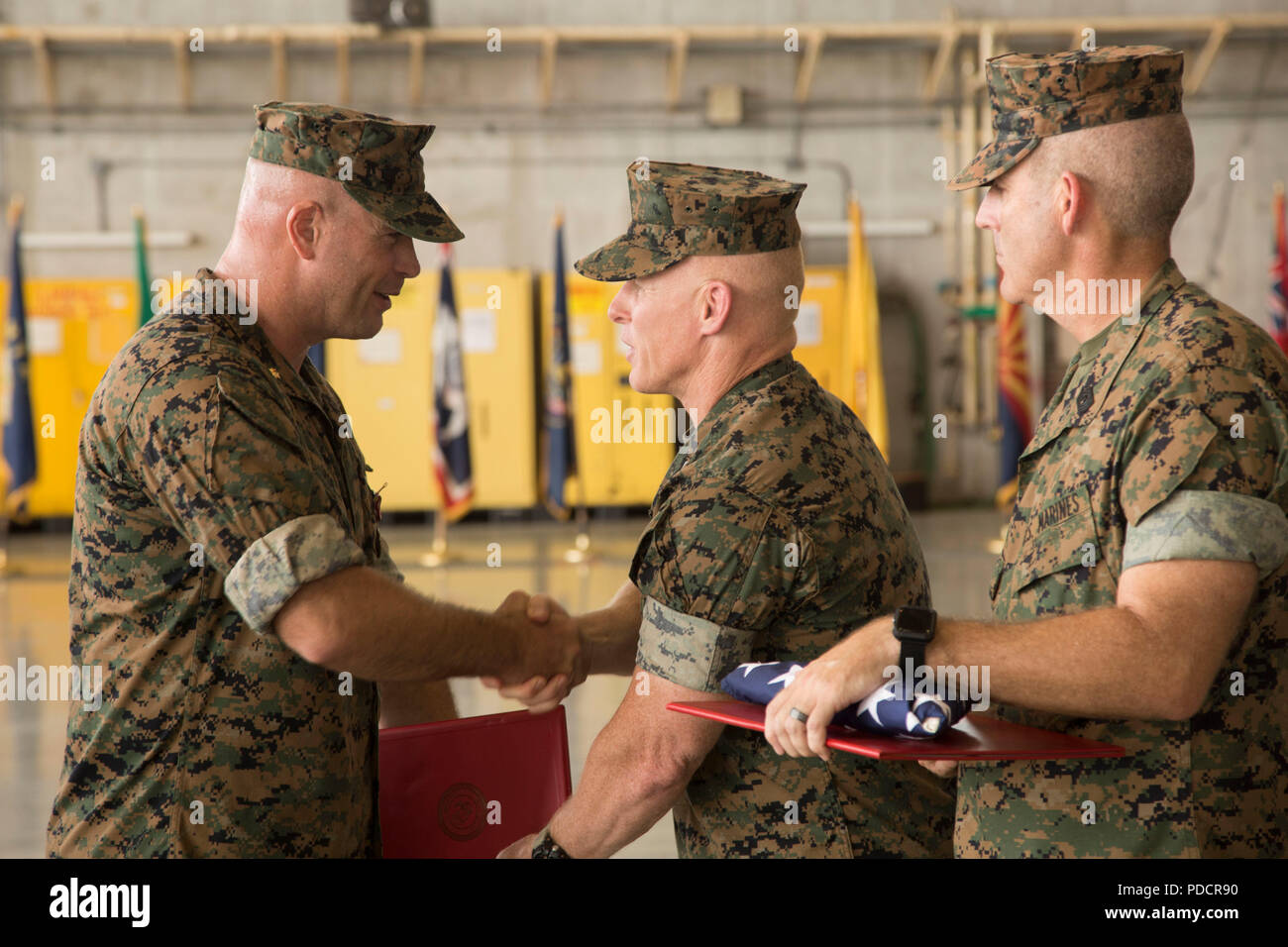 Maj. Daniel Groeling (Left) shakes hands with Maj. Gen. Thomas Weidley ...