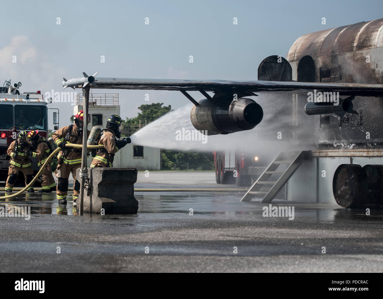 Members from the 18th Civil Engineer Squadron show members from Naha ...