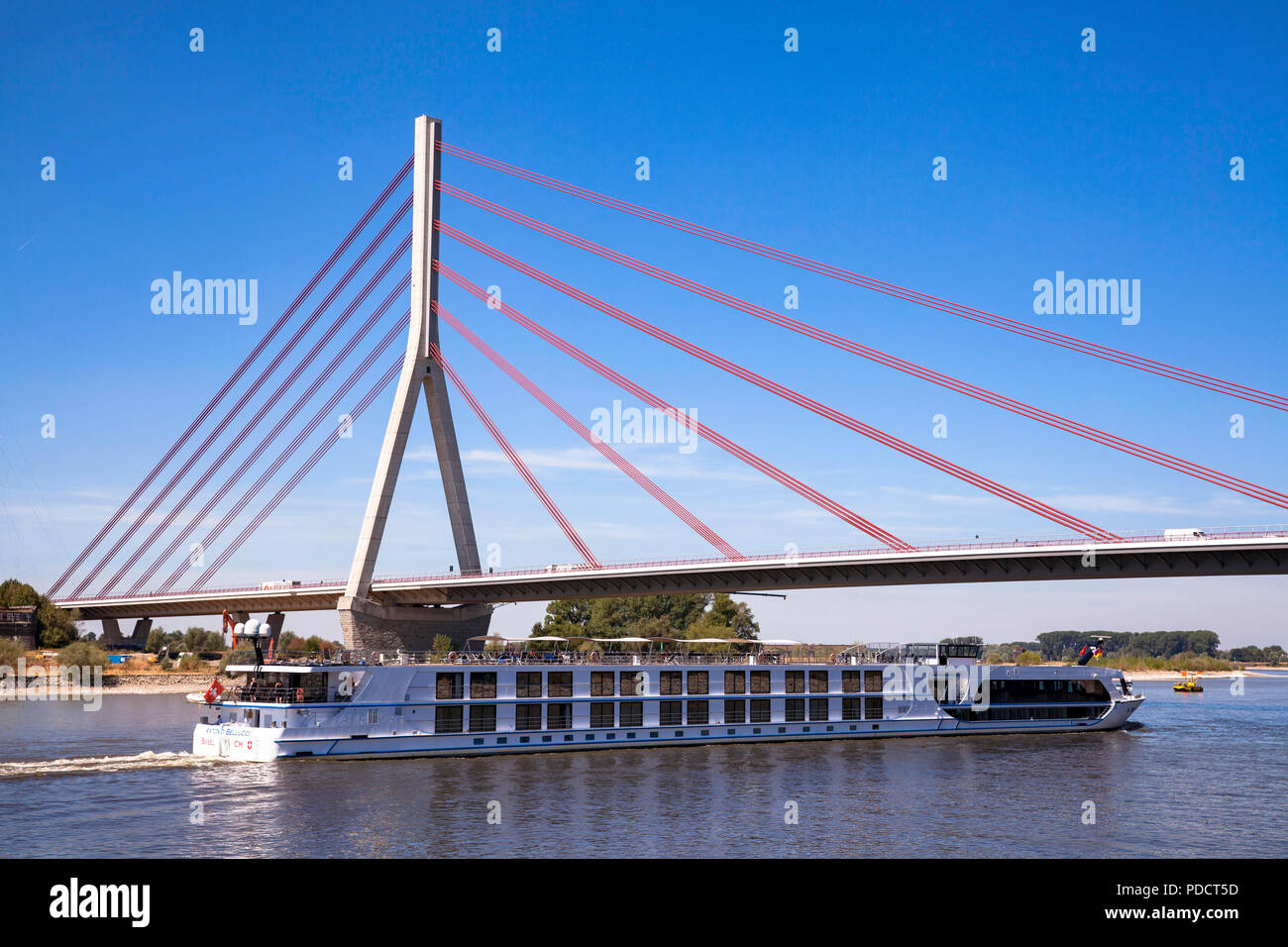 the Niederrhein bridge across the river Rhine, river cruise ship, Wesel ...
