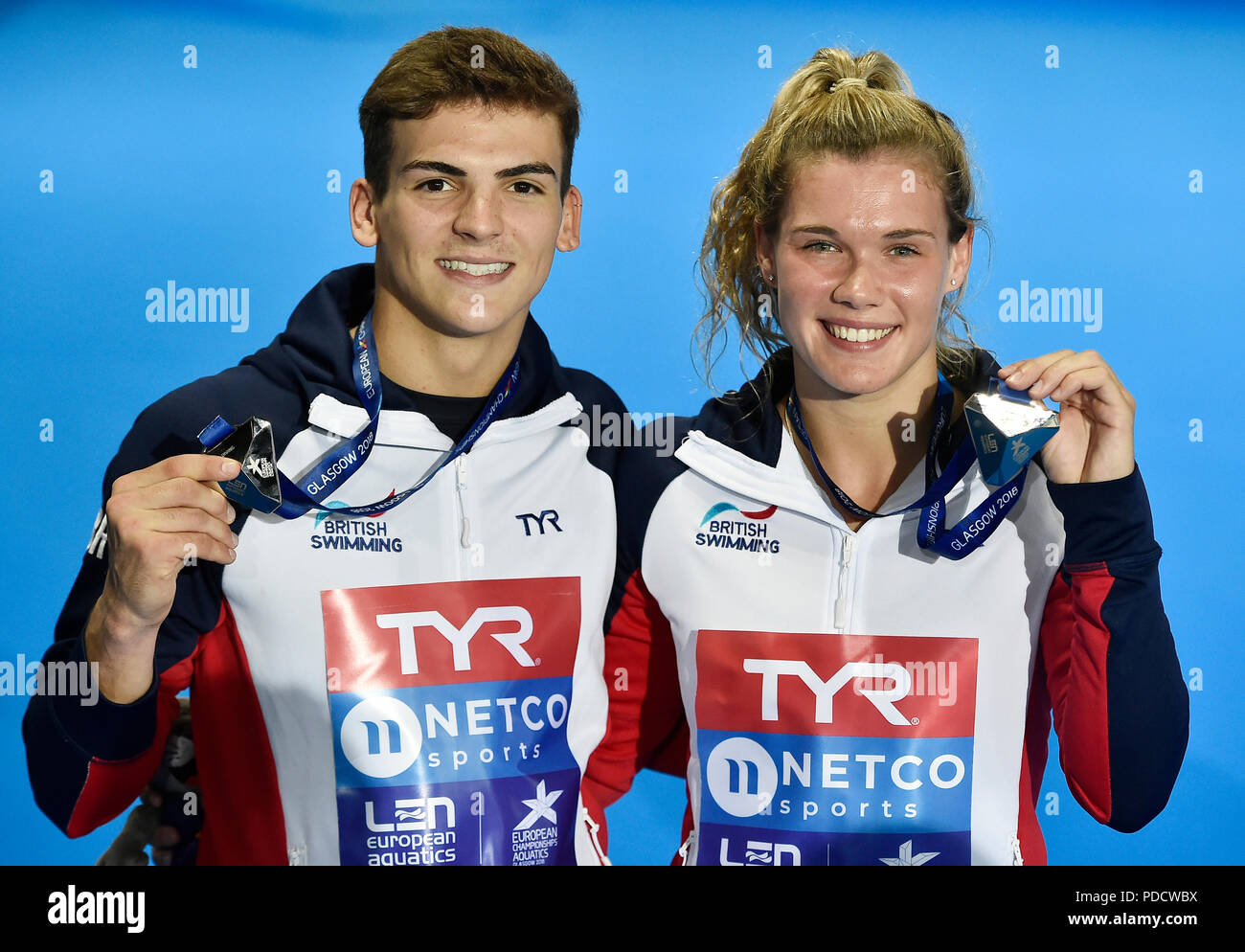 Great Britain's Ross Haslam and Grace Reid (silver) on the podium for ...