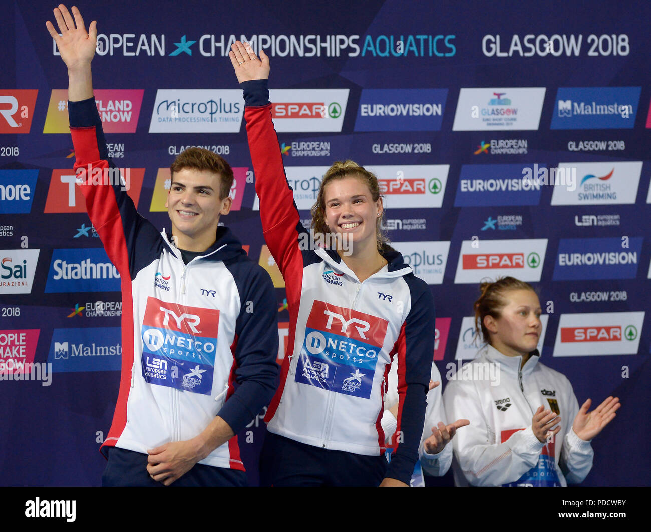 Great Britain's Ross Haslam and Grace Reid (silver) on the podium for ...