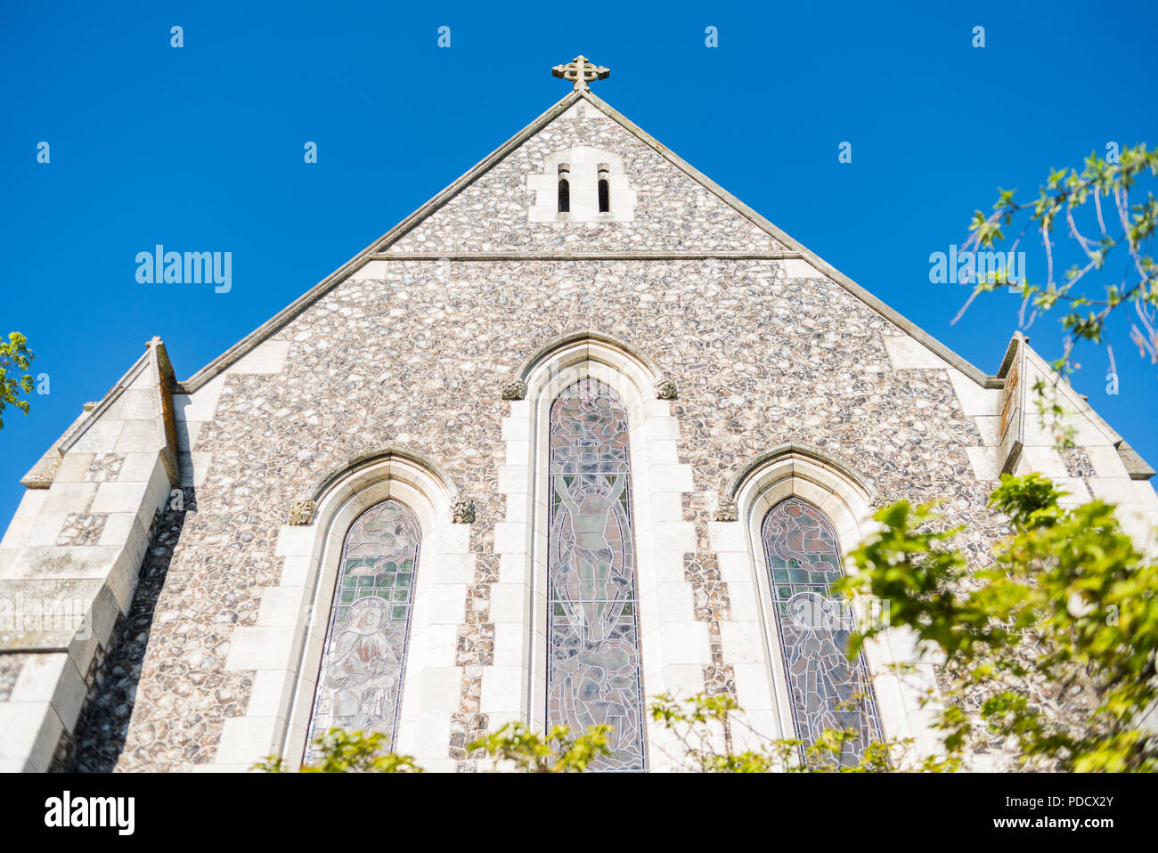 low angle view of beautiful historical church with cross on top against ...