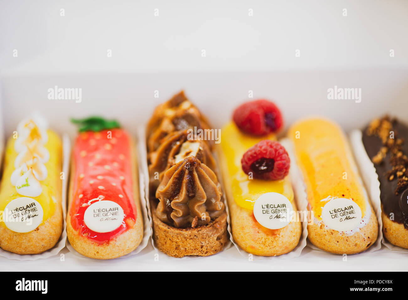 The colourful eclairs at L'Eclair de Genie in Paris, France Stock Photo ...