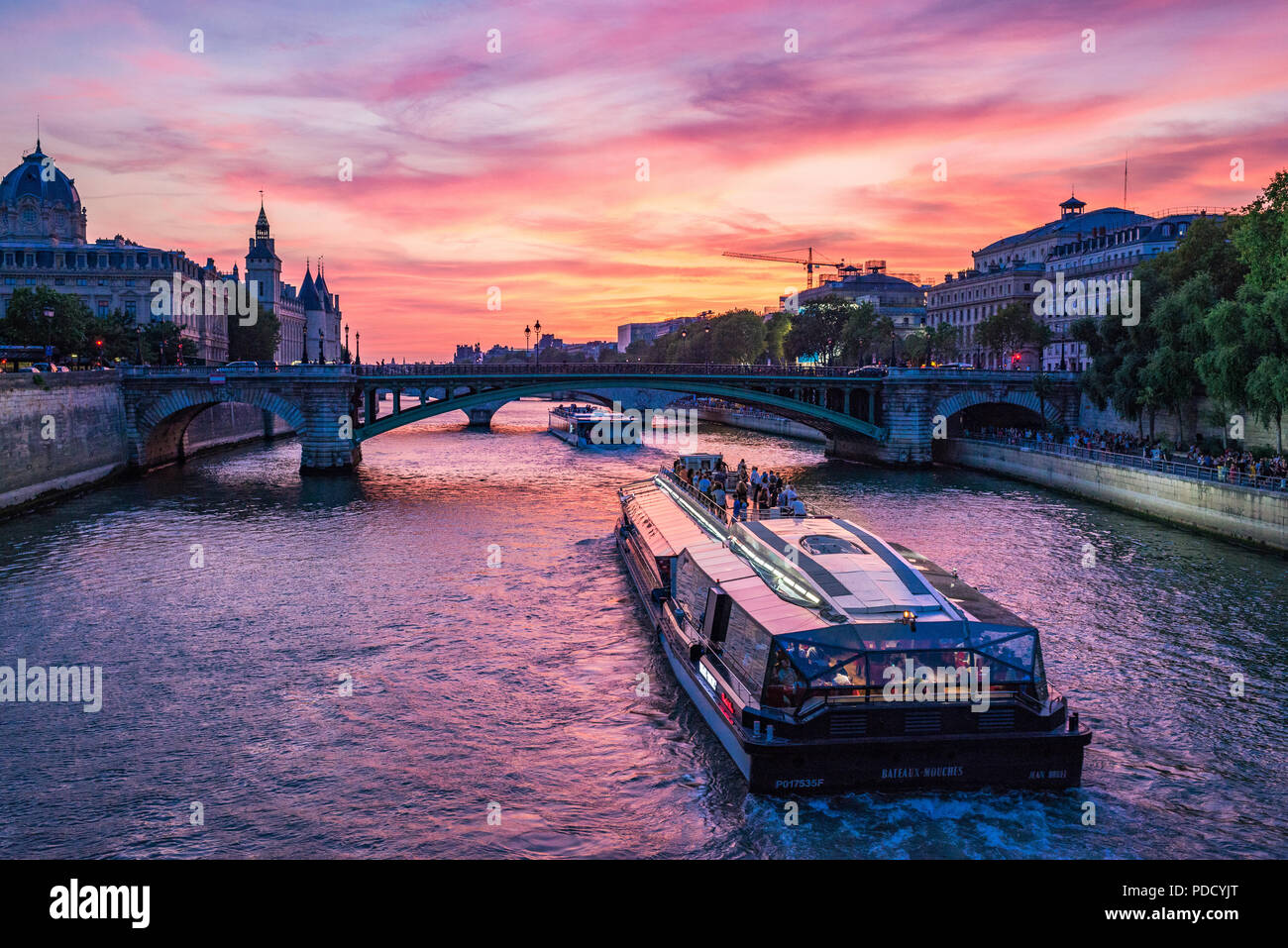The Seine River at sunset. During the summer heatwave of 2018, Paris ...