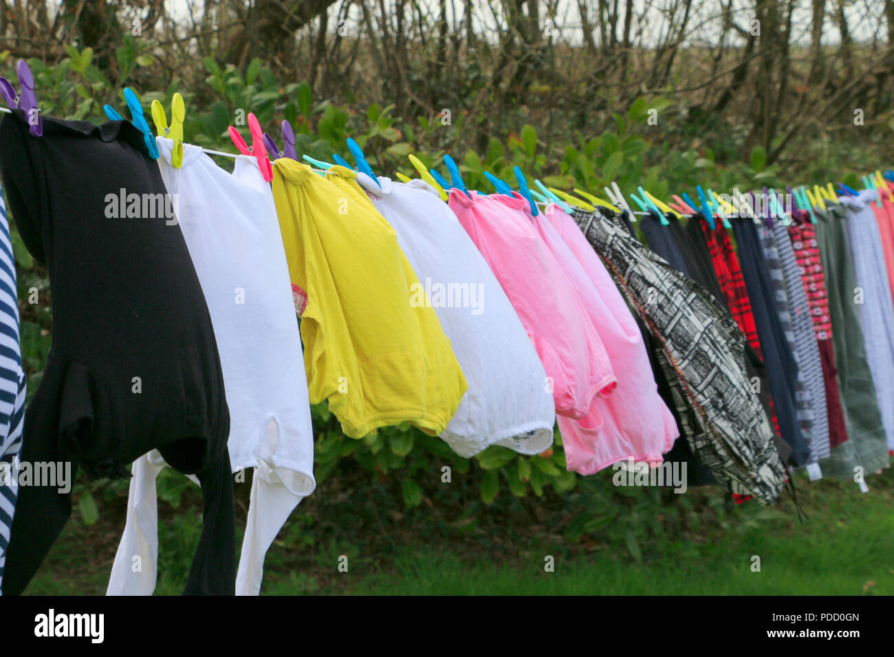 Children's clothes washing line hi-res stock photography and images - Alamy