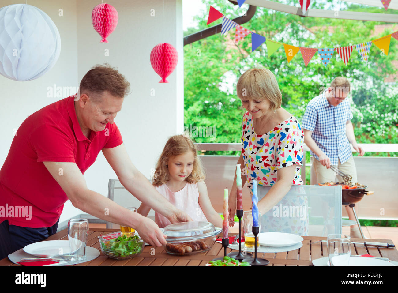 Grilling family grandmother hi-res stock photography and images - Alamy