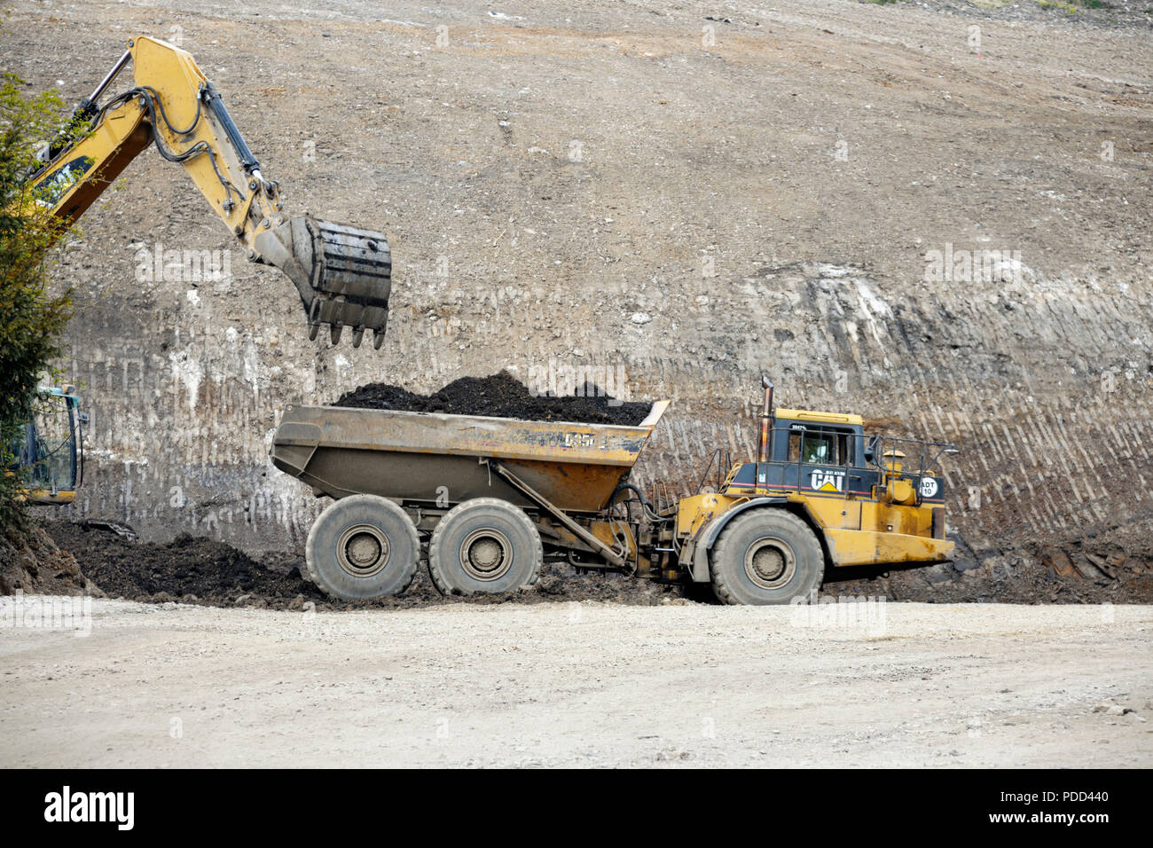 Caterpillar dump truck at work in a Derbyshire quarry Stock Photo - Alamy
