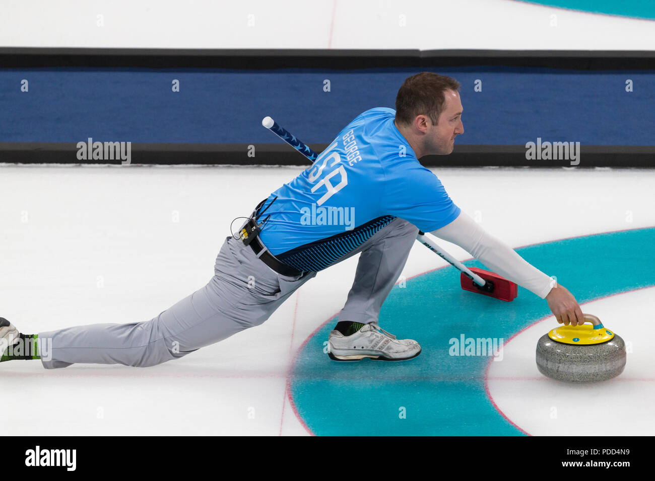 Tyler George (USA) competing in the Team USA vs Team Sweden Curling ...