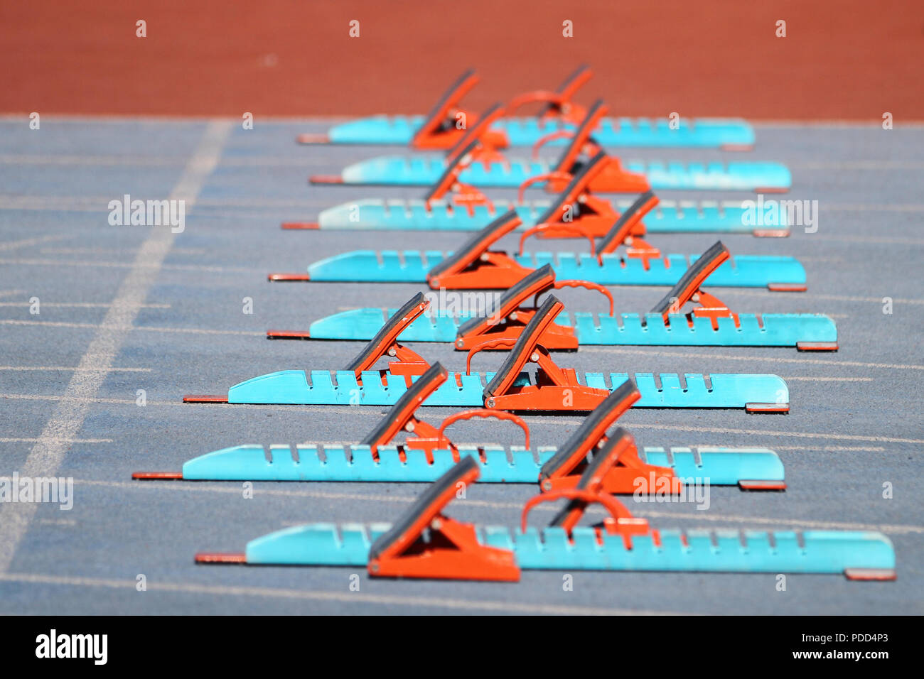 Blue and Orange Starting Blocks in Track and Field Stock Photo - Alamy