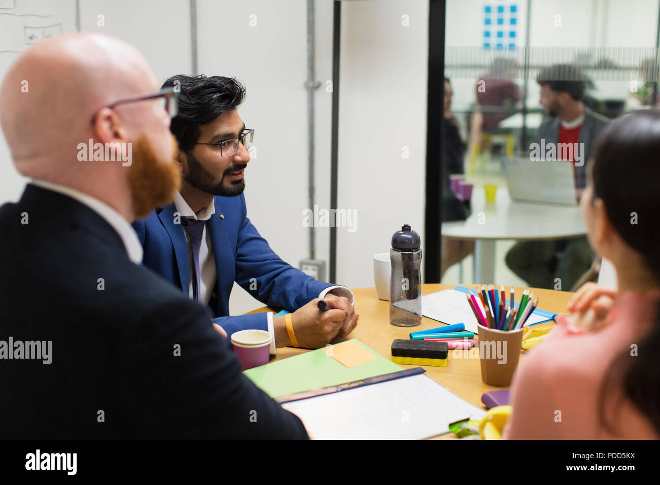 Creative business people talking in conference room meeting Stock Photo ...
