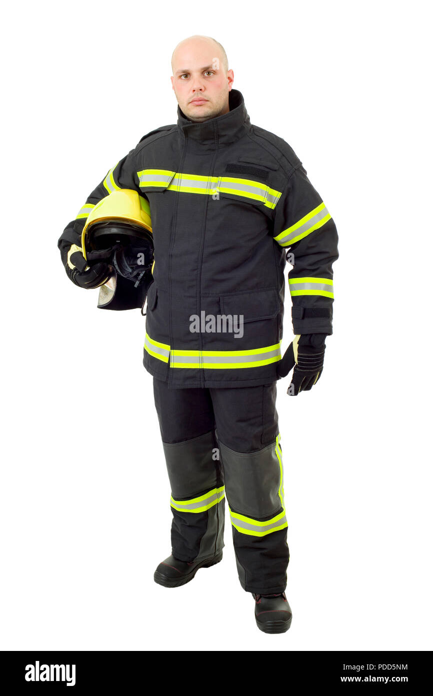 Serious firefighter posing with arms crossed. Full length studio shot ...