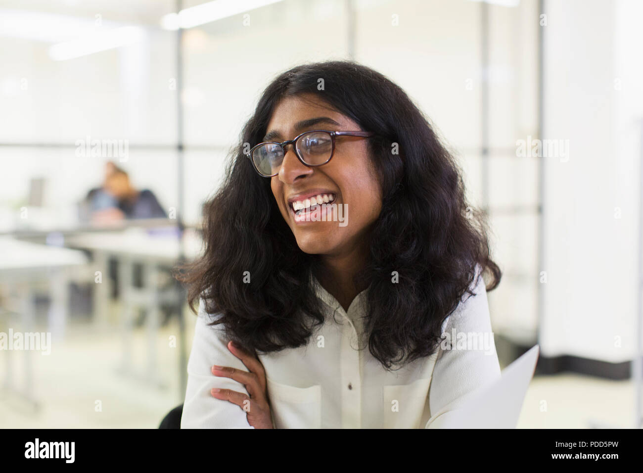 Young confident businesswoman hi-res stock photography and images - Alamy