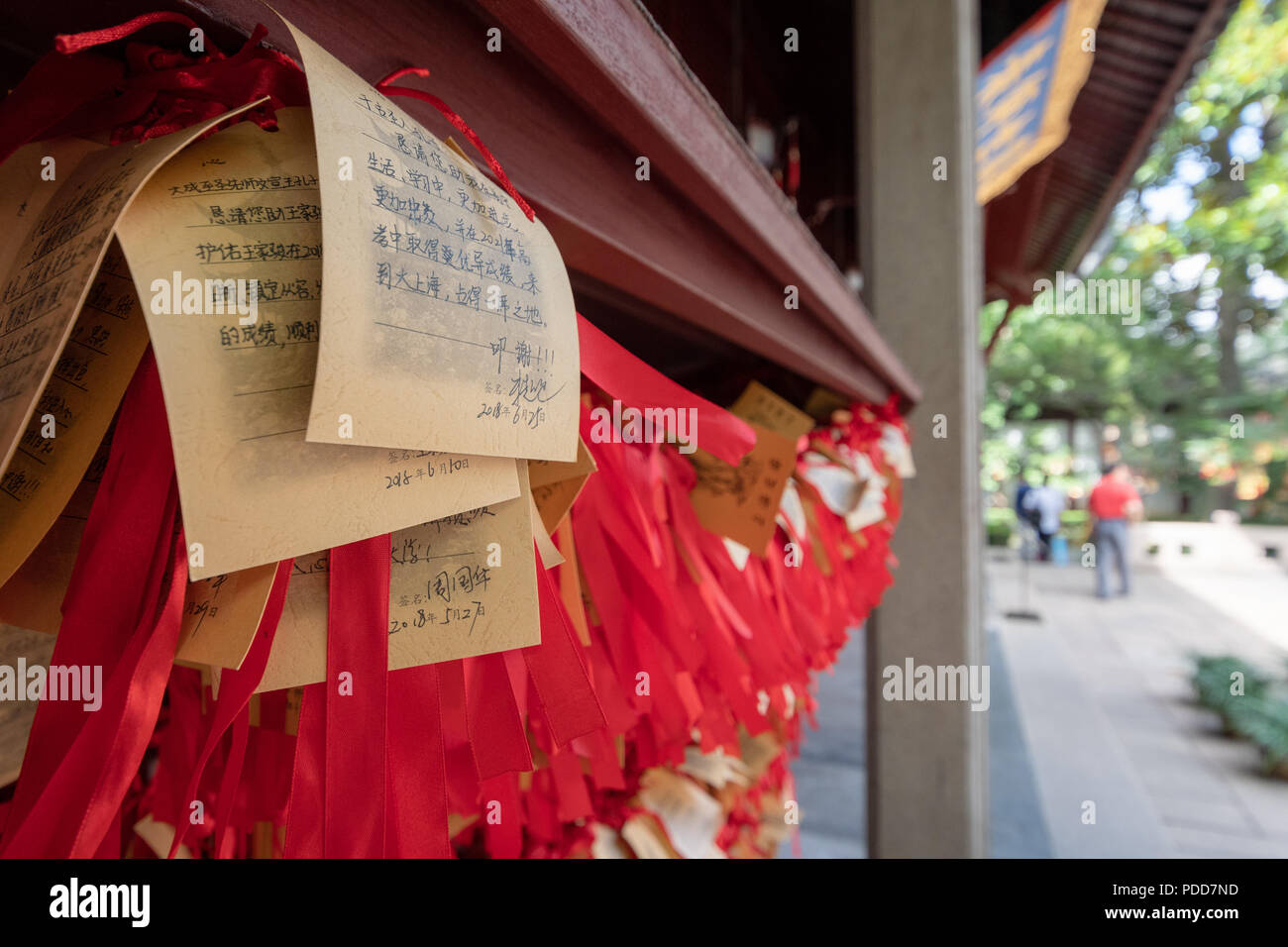 Tokens with personalised inscriptions at a Buddhist temple in Shanhgai ...